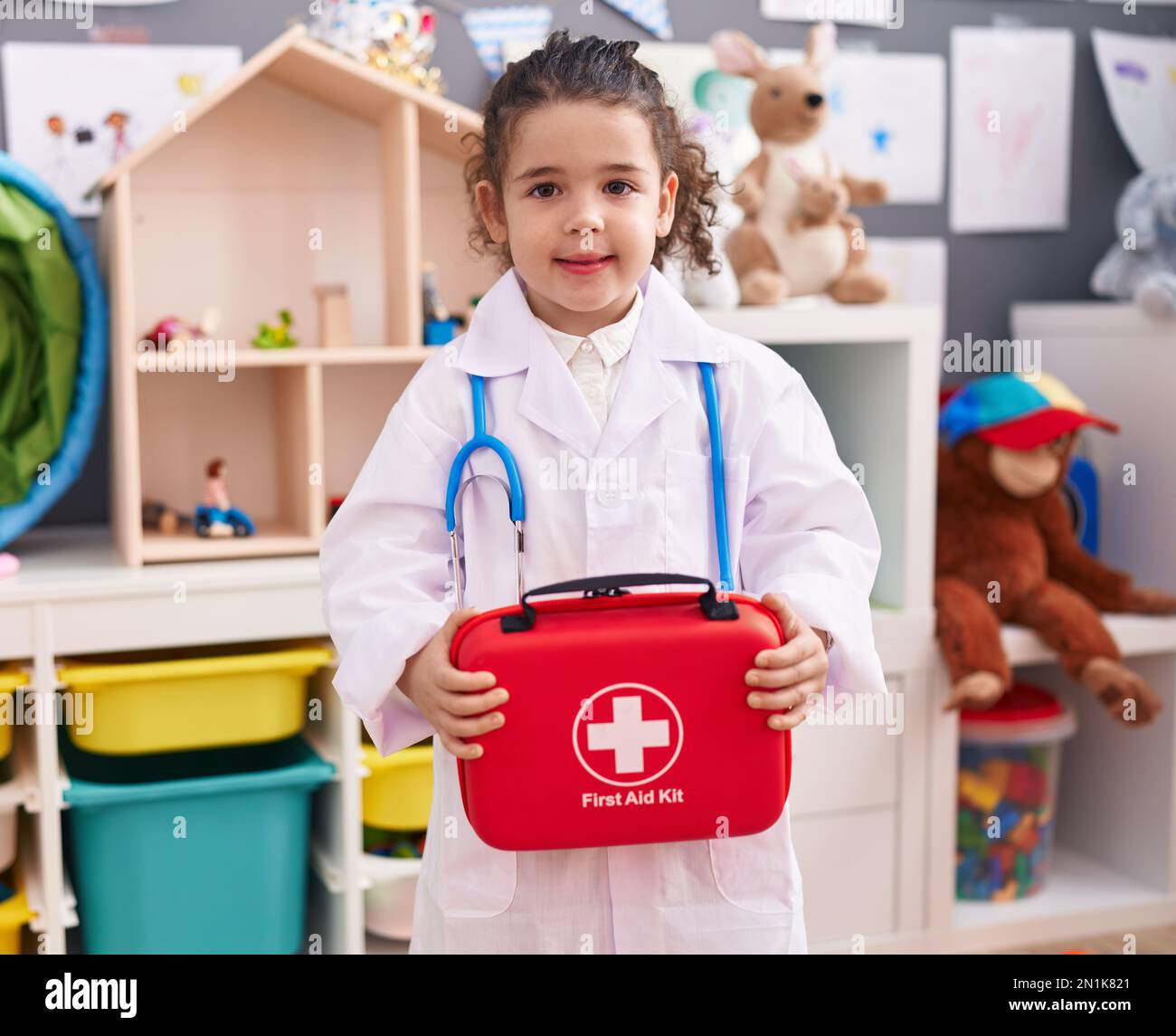 Doctor children game kindergarten hi-res stock photography and images ...
