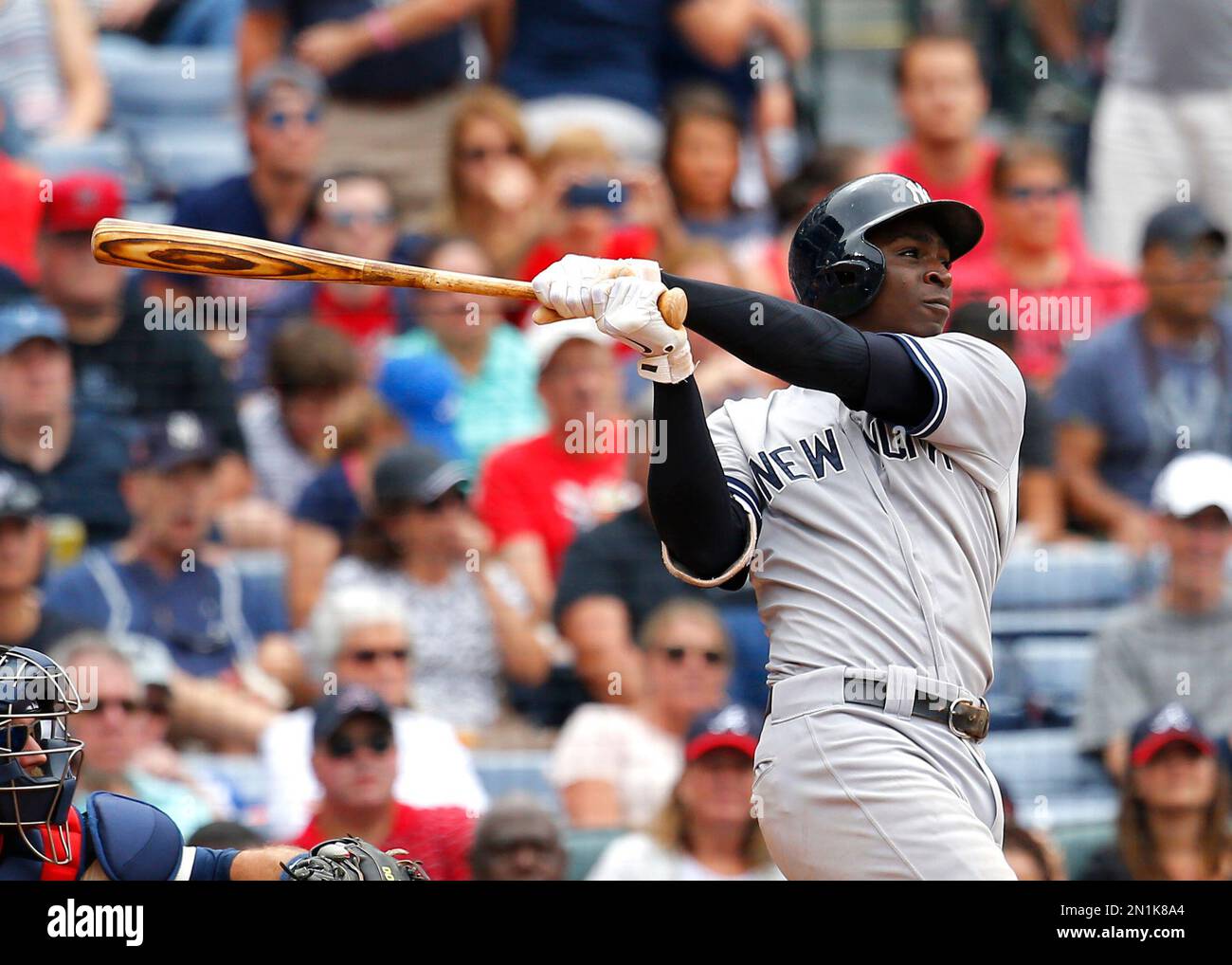 New York Yankees' Didi Gregorius, right, singles to load the bases in ...