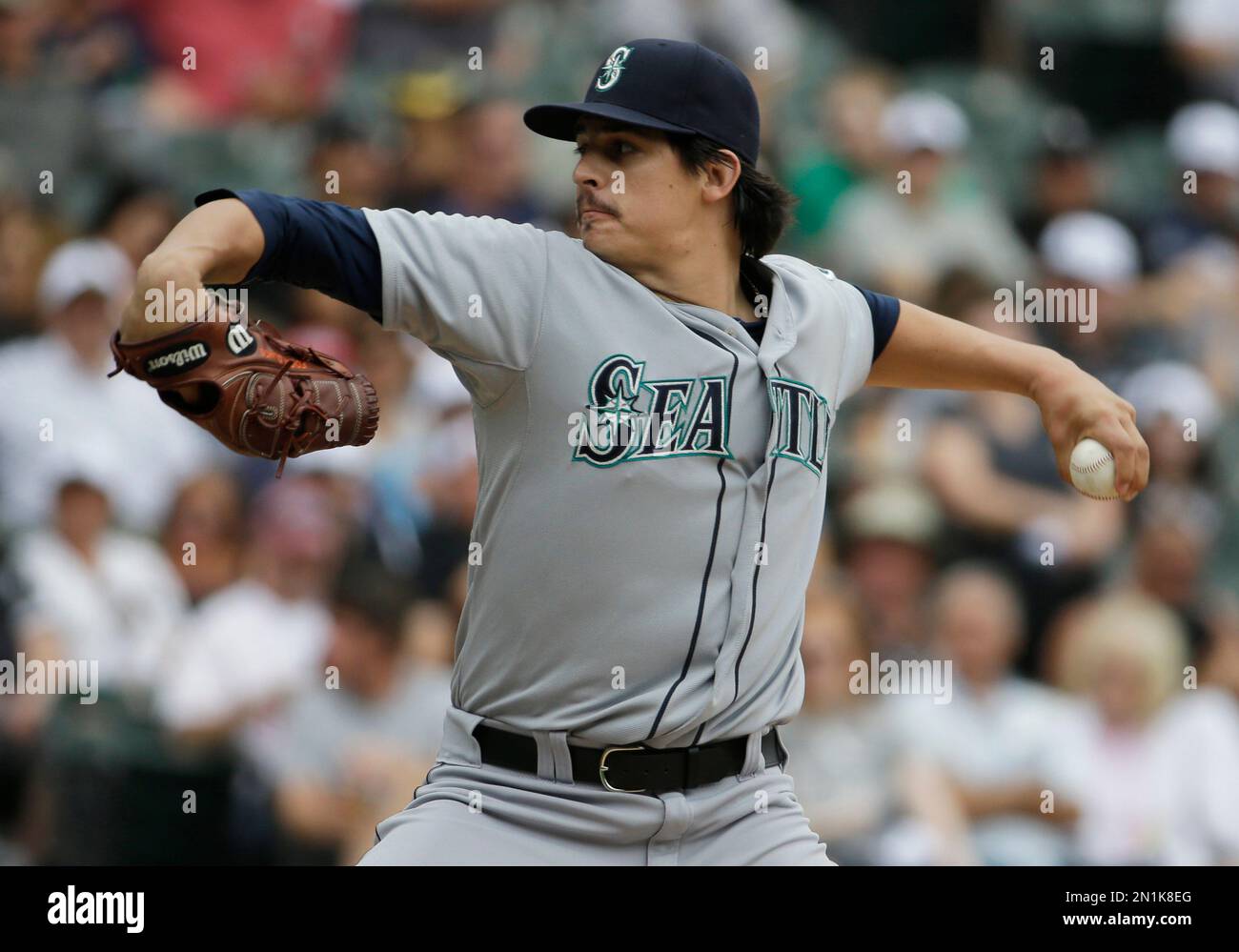 Seattle Mariners starter Edgar Olmos throws against the Chicago White ...