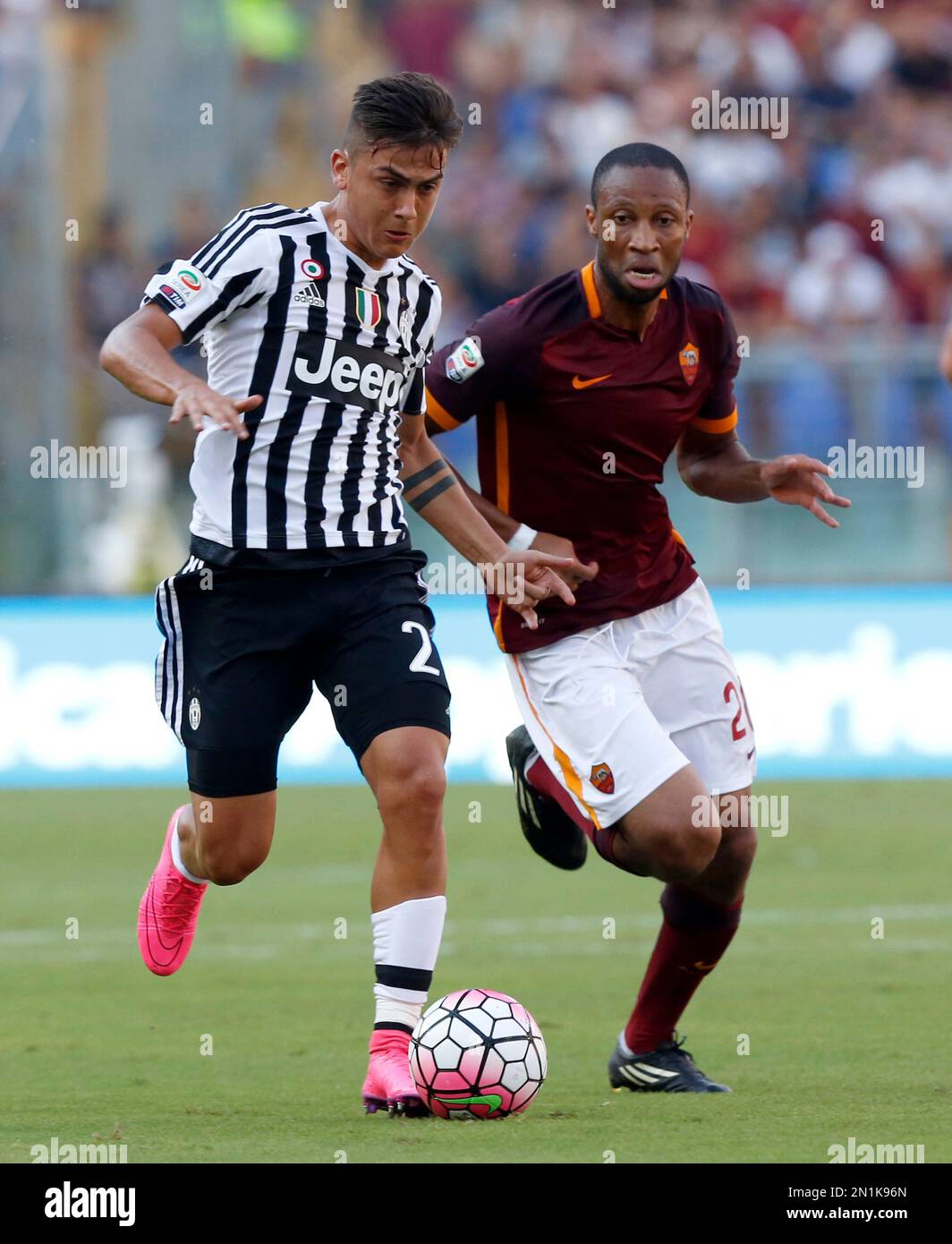 Juventus’ Paulo Dybala, left, is chased by Roma’s Seydou Keita during a ...