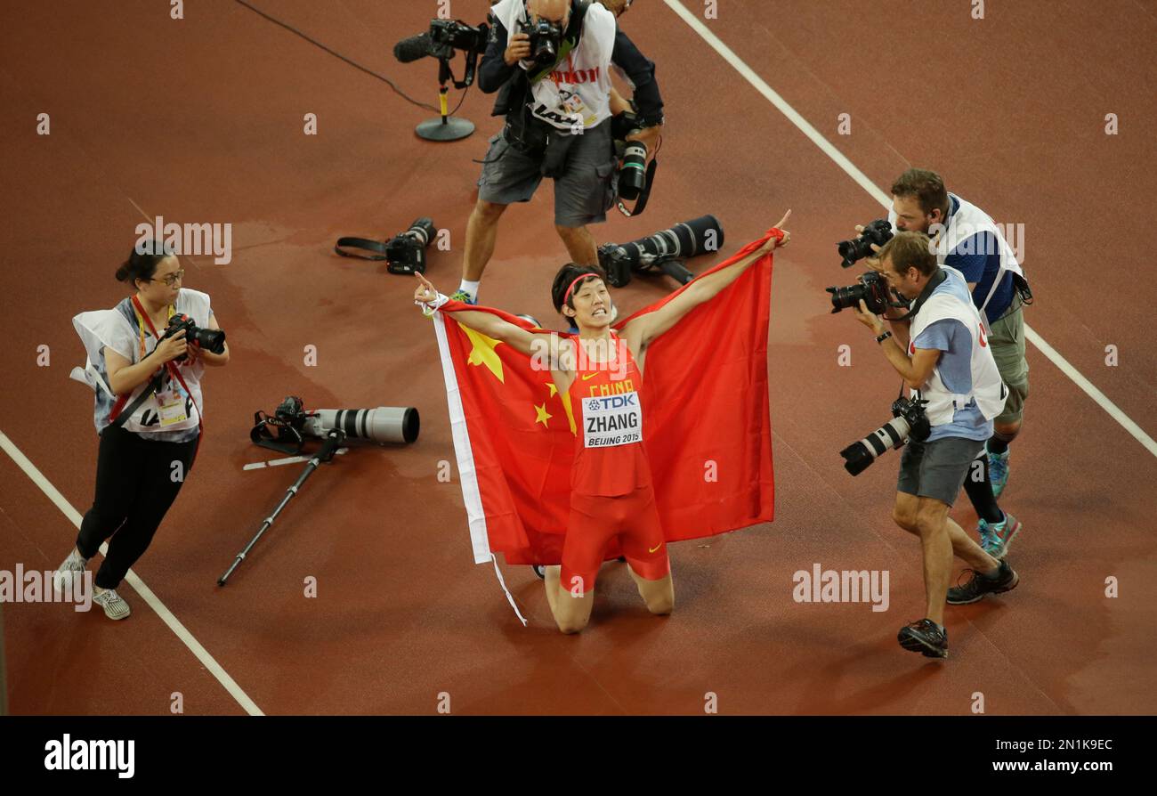 China's Zhang Guowei celebrates winning silver in the men’s high jump ...