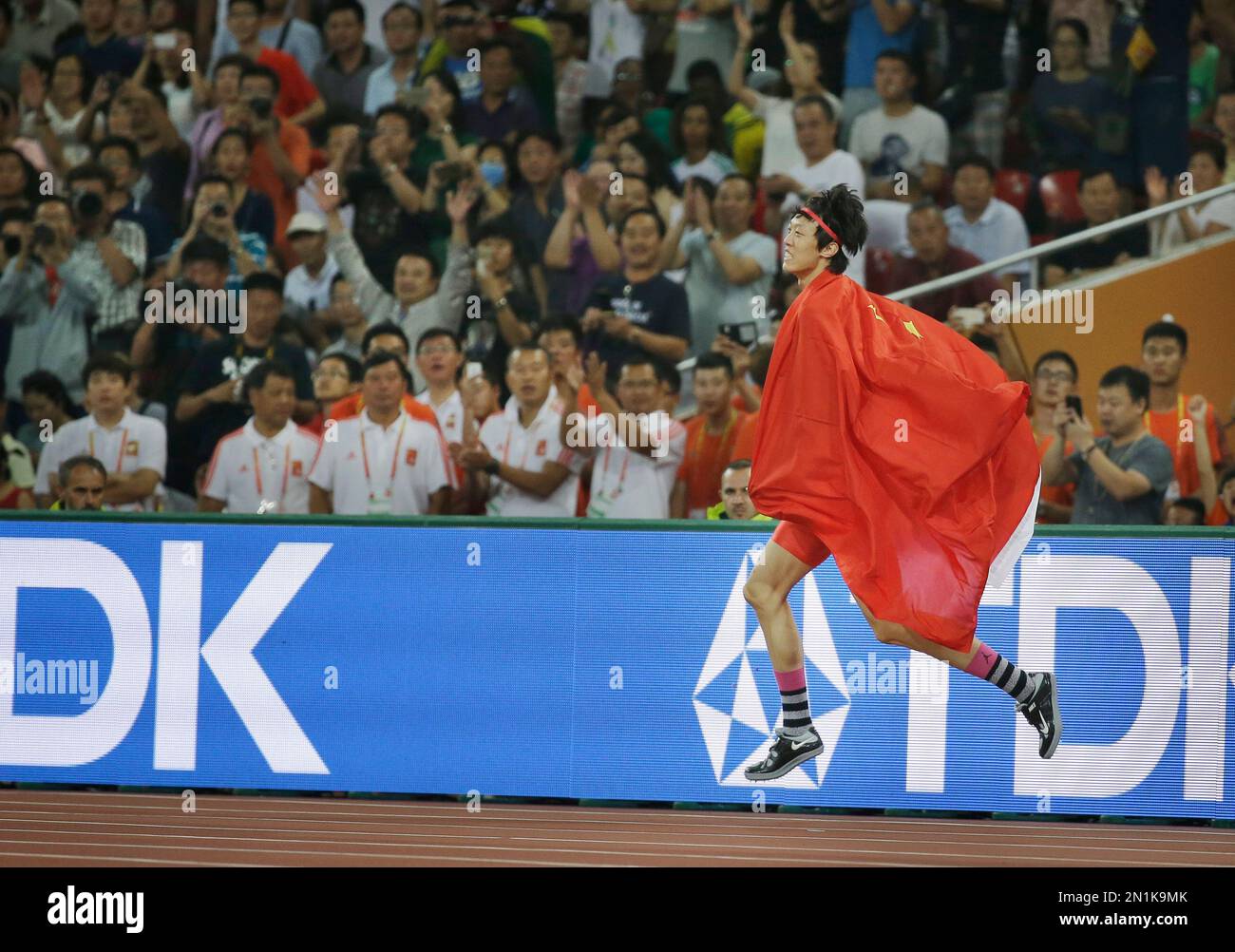 China's Zhang Guowei celebrates winning silver in the men’s high jump ...