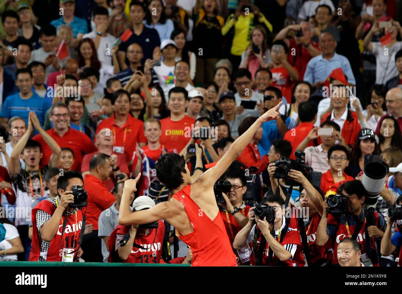 China's Zhang Guowei reacts after winning the silver medal in the men's ...