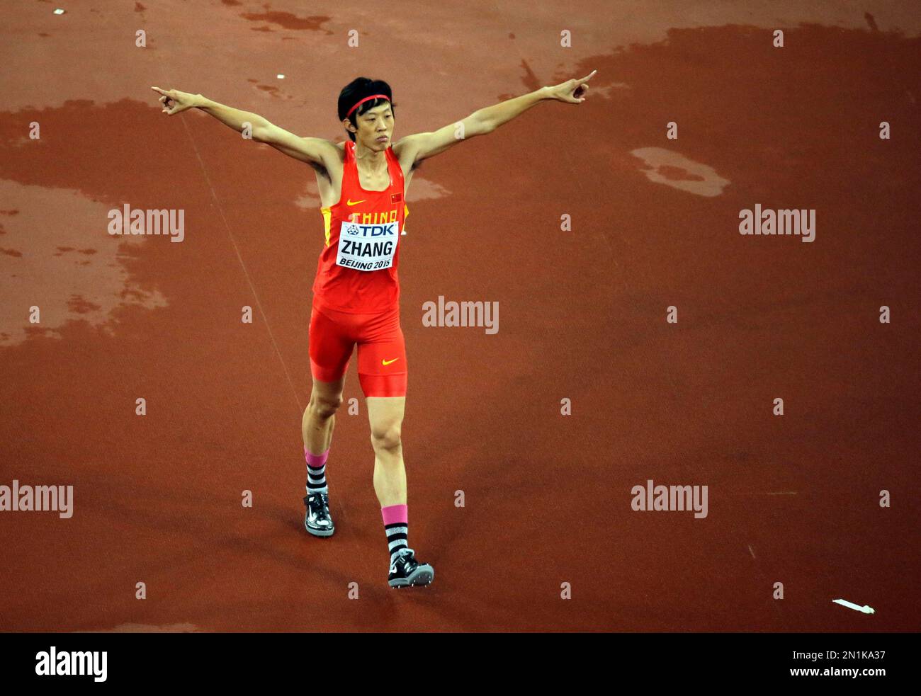 China's Zhang Guowei reacts on his way to winning the silver medal in the men's high jump at the ...