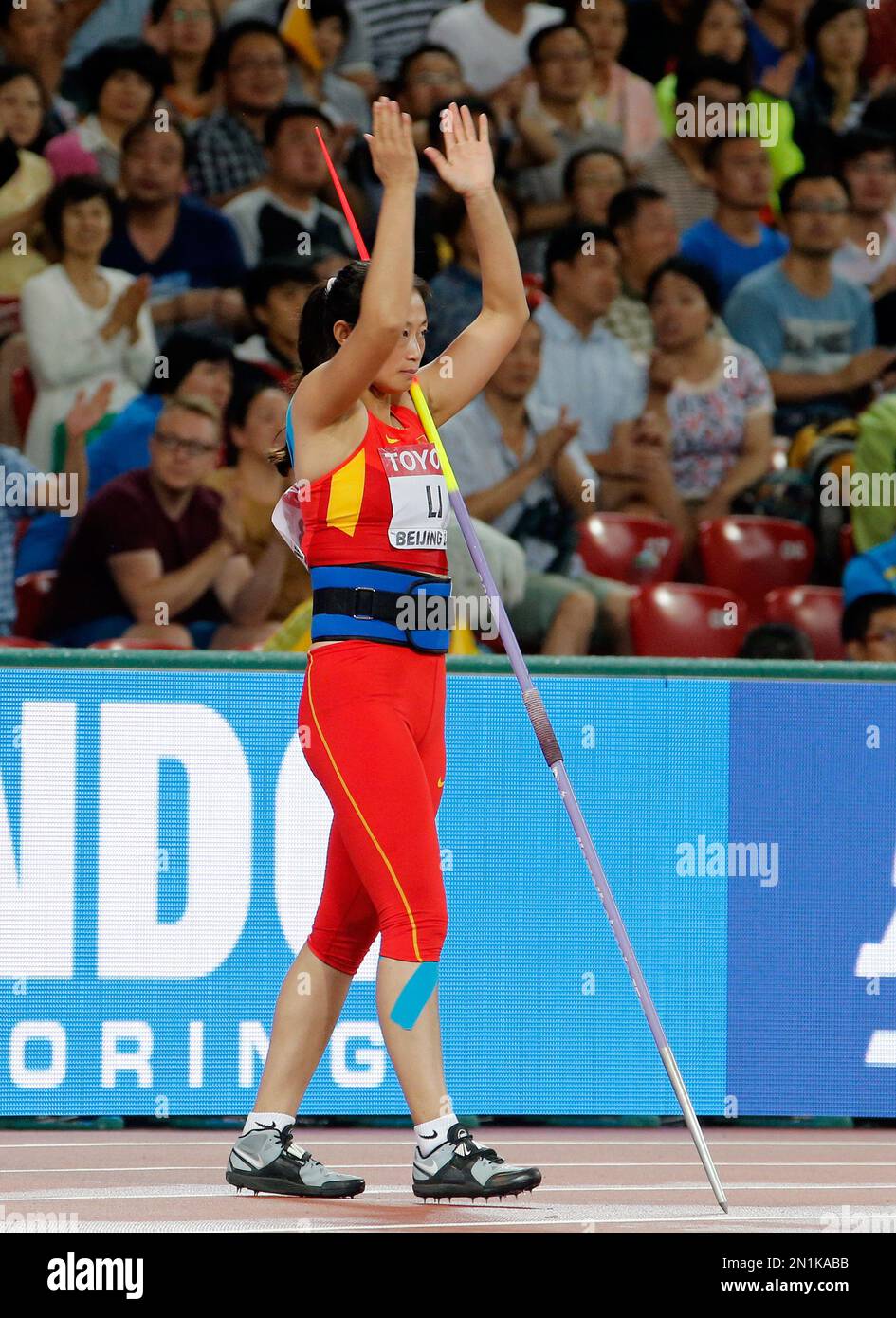 China's Li Lingwei gets ready for a throw in the women’s javelin throw ...