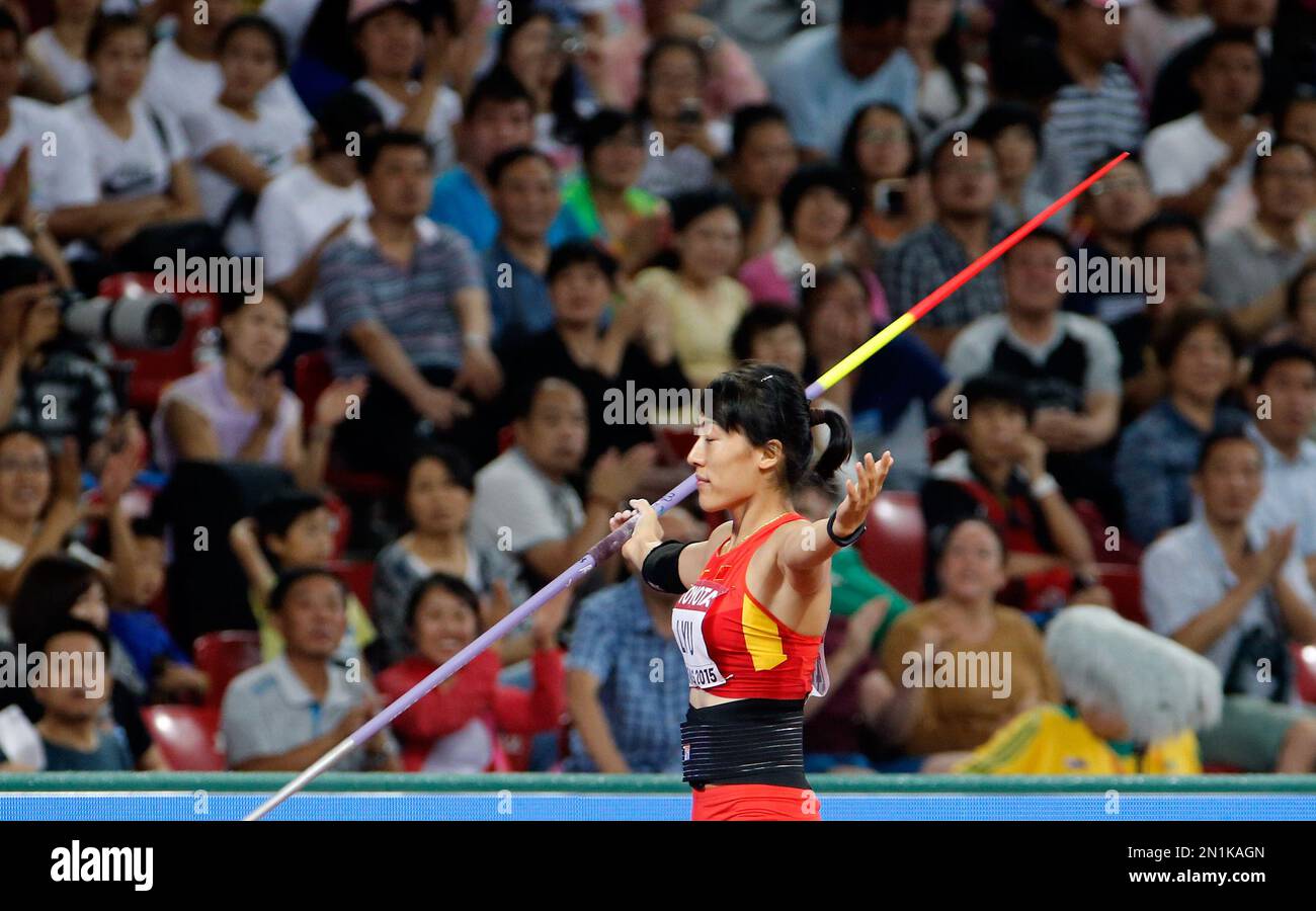 China's Lyu Huihui gets ready for a throw in the women’s javelin throw ...