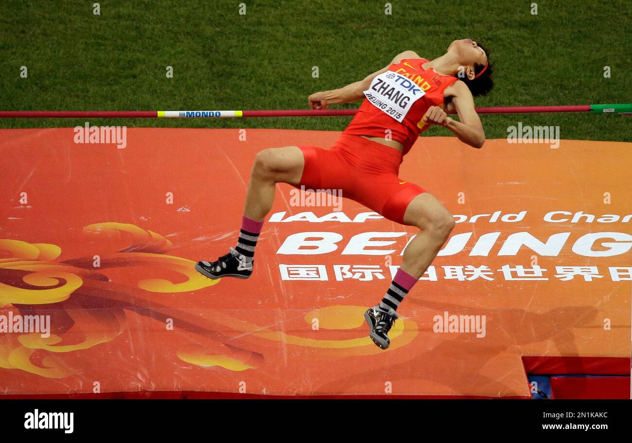 China's Zhang Guowei clears the bar in the men's high jump final at the ...