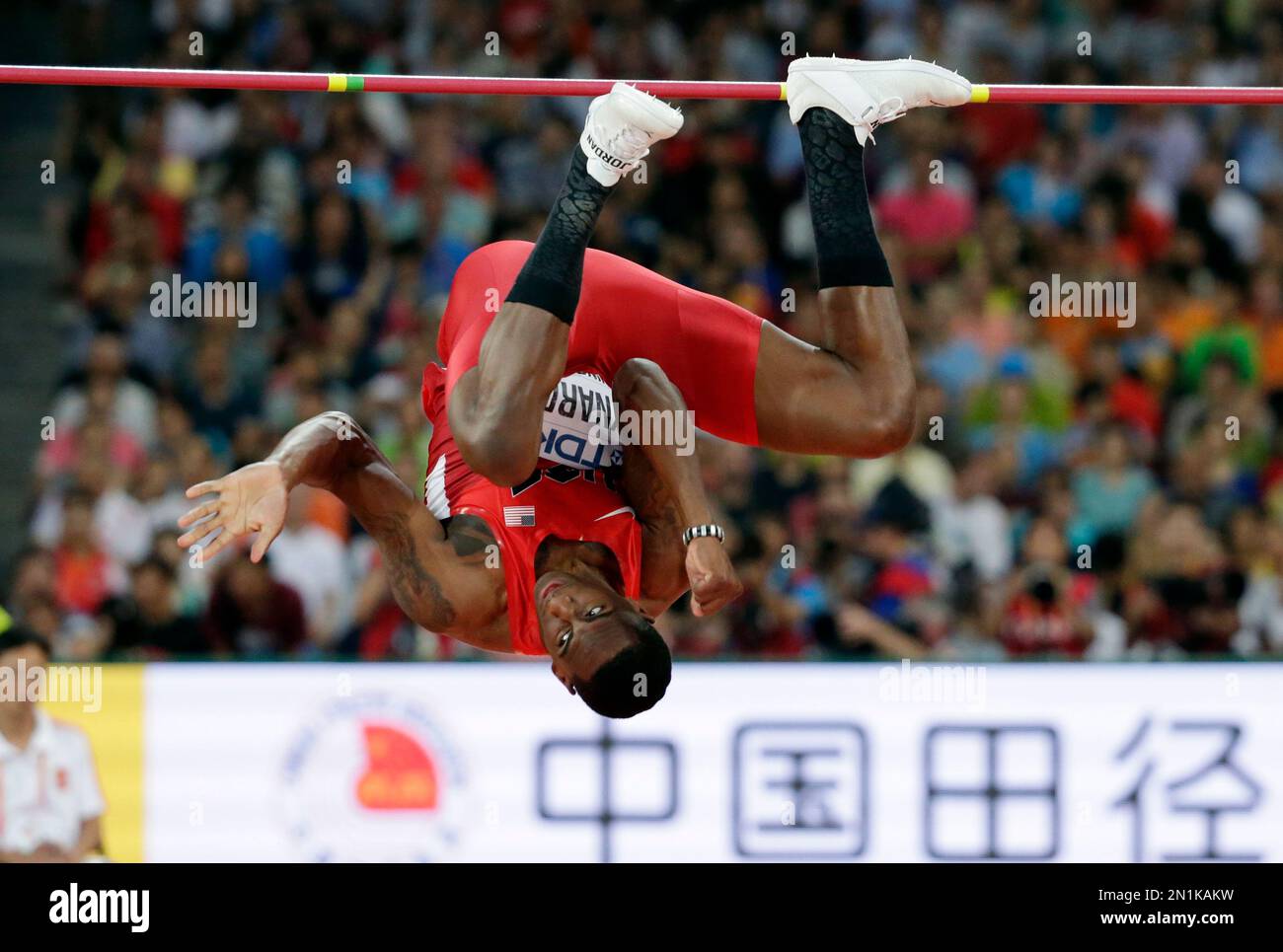 United States' Erik Kynard clears the bar in the men's high jump final ...
