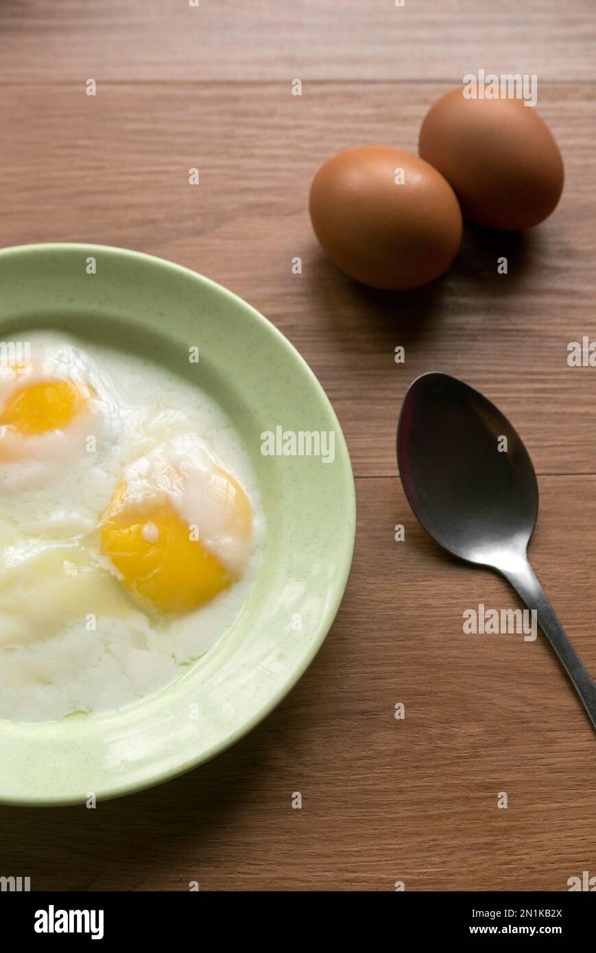Half boiled eggs. Malaysian breakfast Stock Photo - Alamy