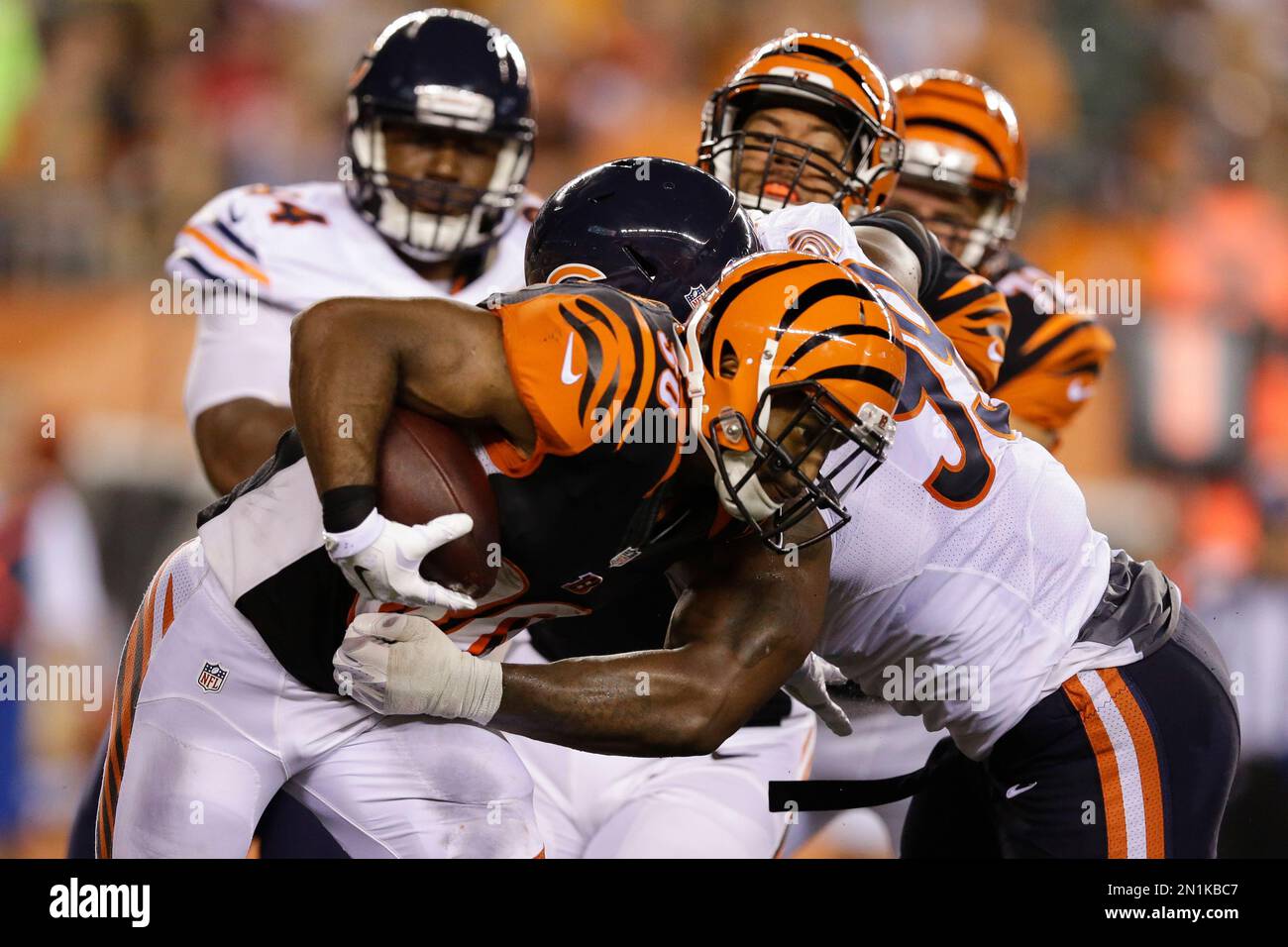 Cincinnati Bengals running back Cedric Peerman (30) is tackled by ...