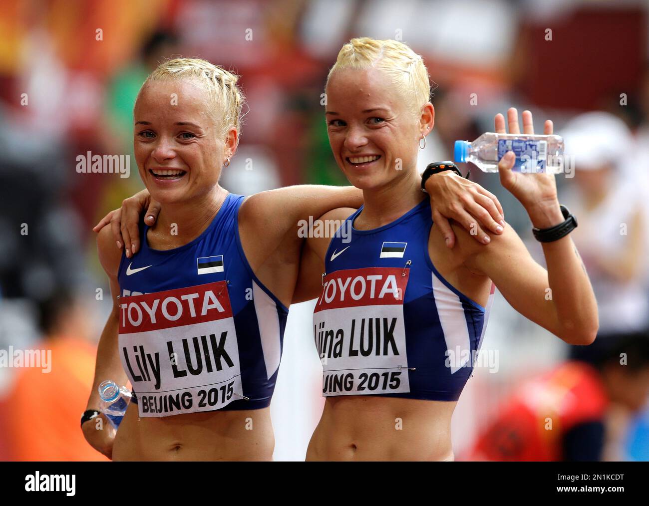 Estonia's Lily Luik, left, and Liina Luik smile after finishing the ...