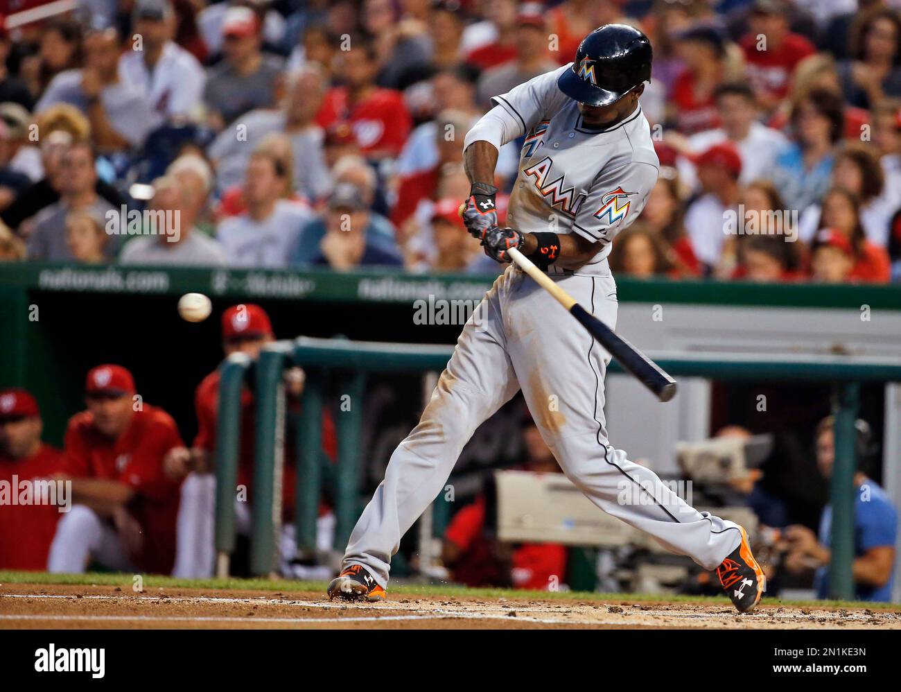 Miami Marlins' Dee Gordon hits a double during the third inning of a ...