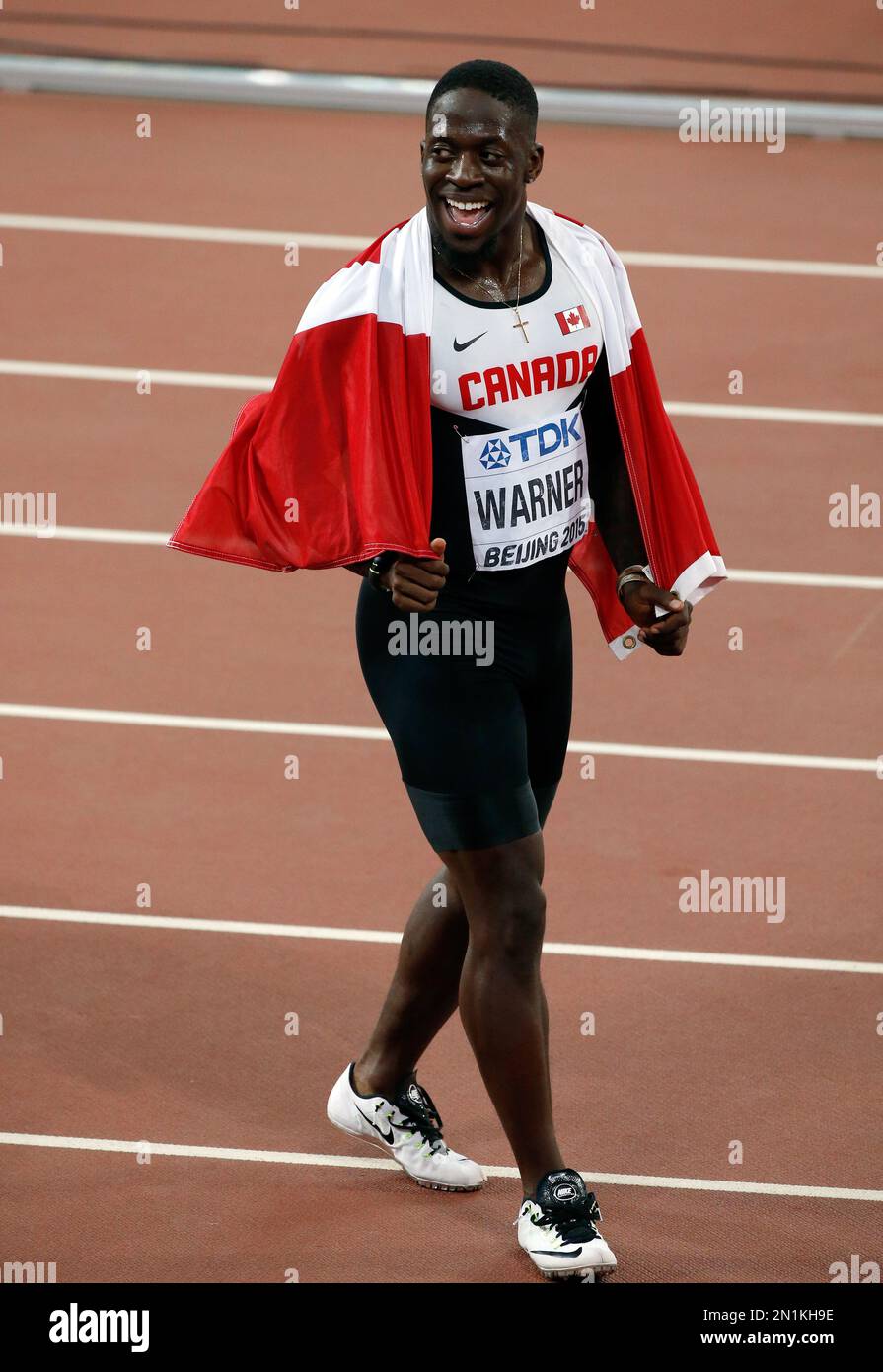 Canada's Justyn Warner celebrates after winning a bronze medal in the ...