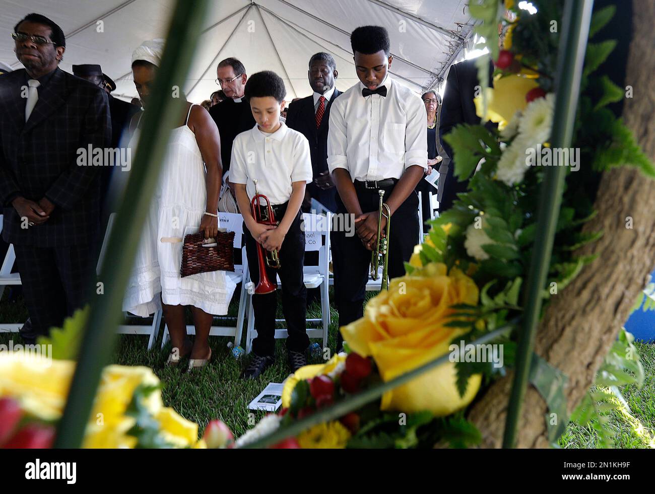 Cameron Clark, right, and Aaron Covin, second left, bow during the ...