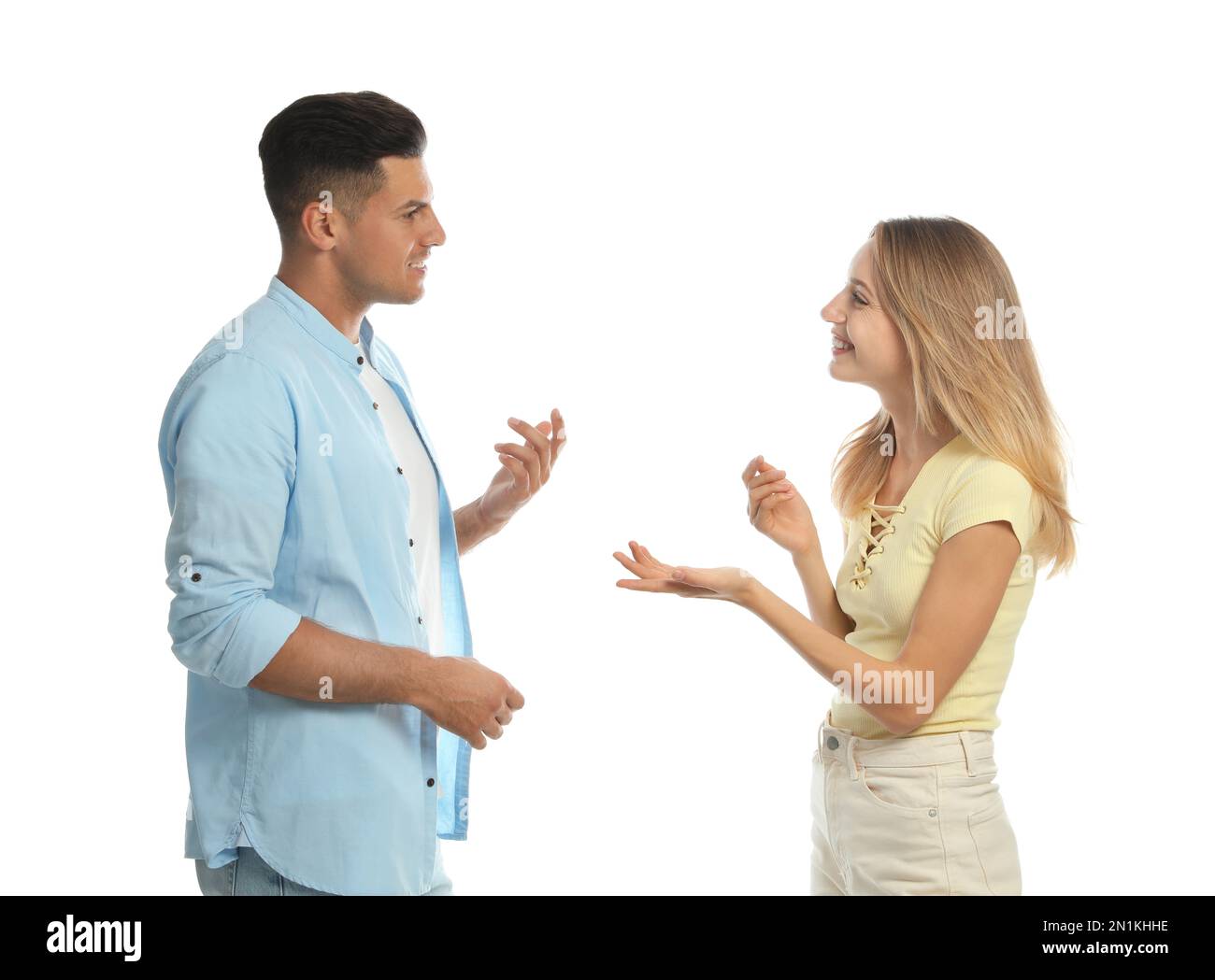 Man and woman talking on white background Stock Photo - Alamy