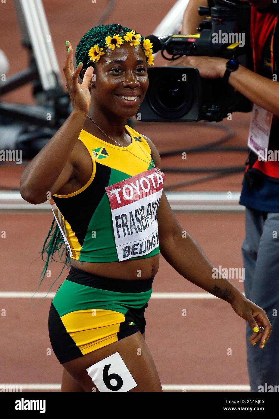Jamaica's Shelly-Ann Fraser-Pryce waves after winning the women’s ...