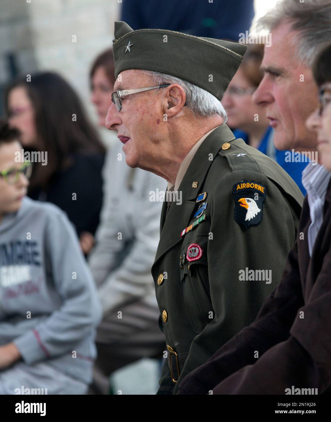 A man wearing a period WWII American Army uniform attends a memorial ...