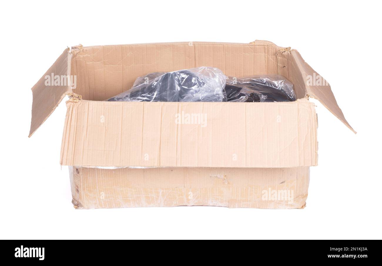 Battered cartboard box isolated on a white background Stock Photo - Alamy