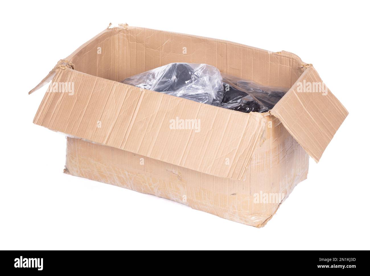 Battered cartboard box isolated on a white background Stock Photo - Alamy