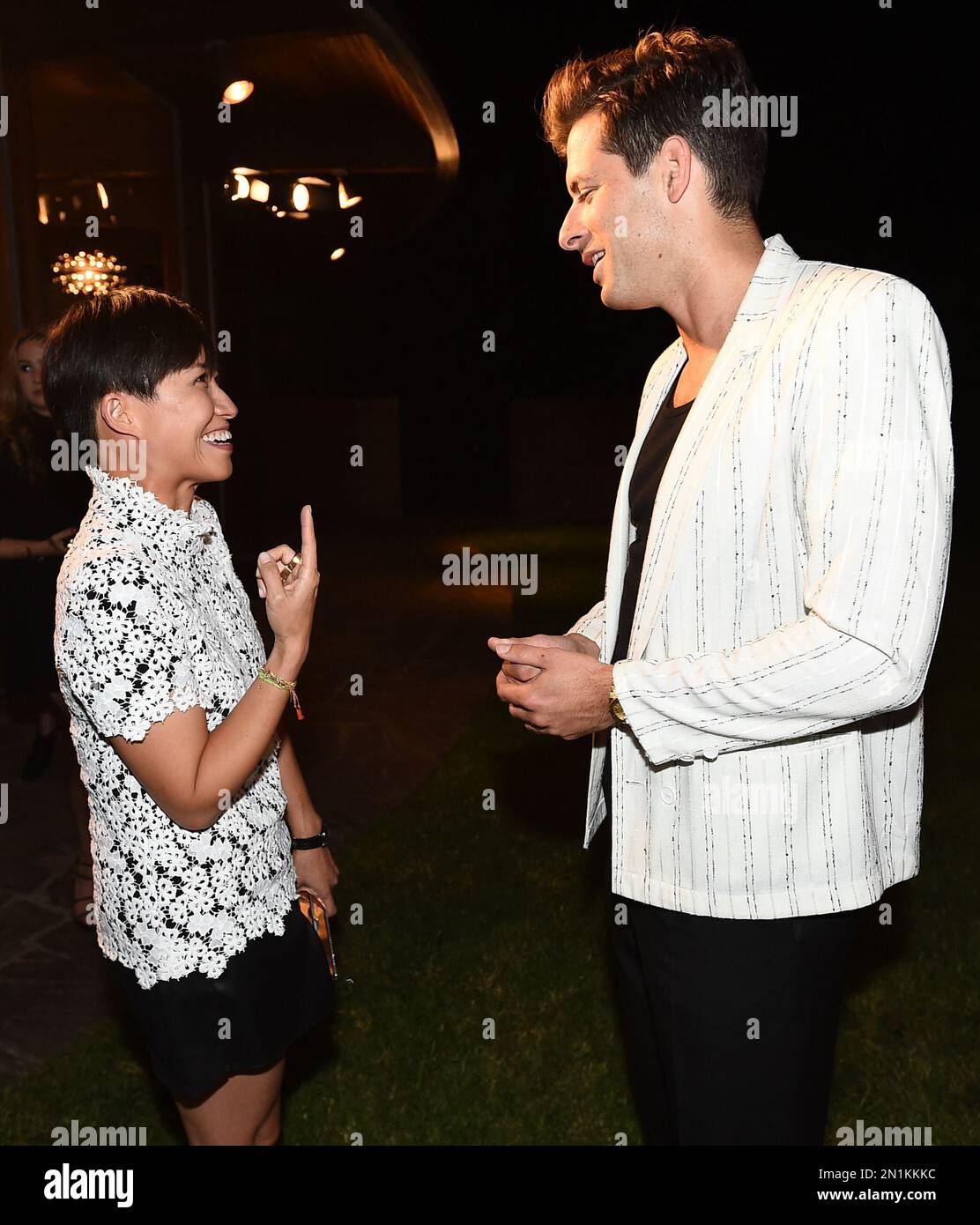 Sandra Choi, Jimmy Choo creative director, left and Mark Ronson attend ...