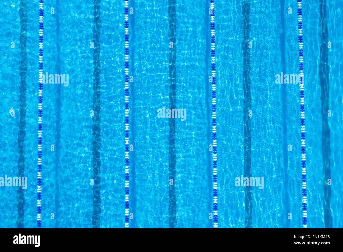 Swimming pool with racing lane dividers, top view Stock Photo - Alamy