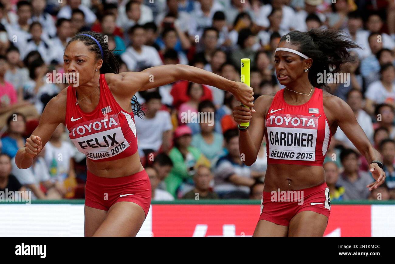 Allyson Felix of the United States, left, takes the baton from English ...