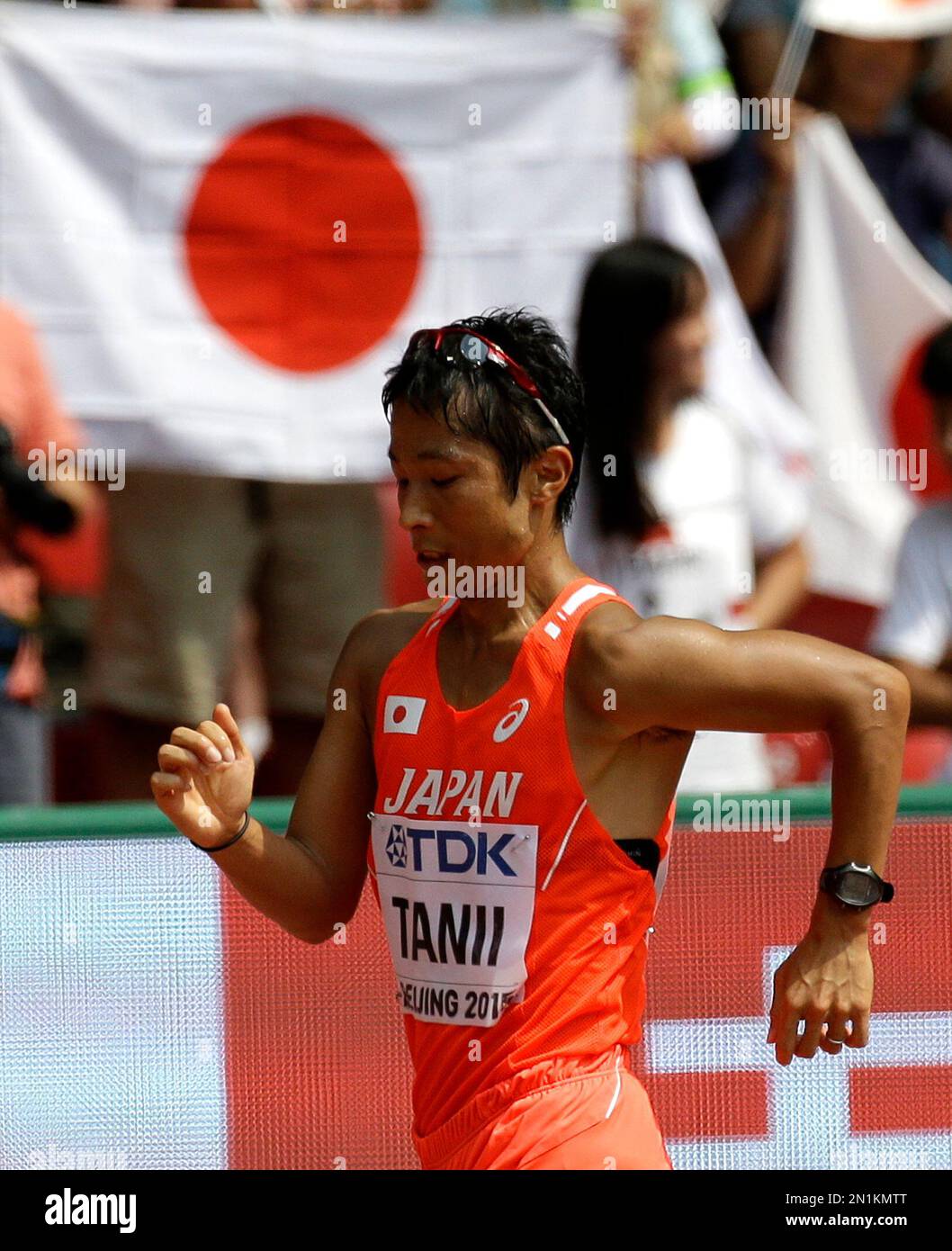 Japan's Takayuki Tanii races to the bronze medal in the men's 50k race ...