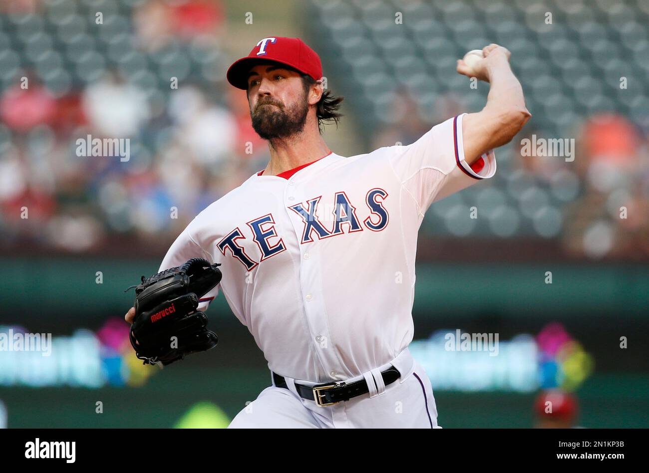 Texas Rangers Starting Pitcher Cole Hamels Works Against The Baltimore