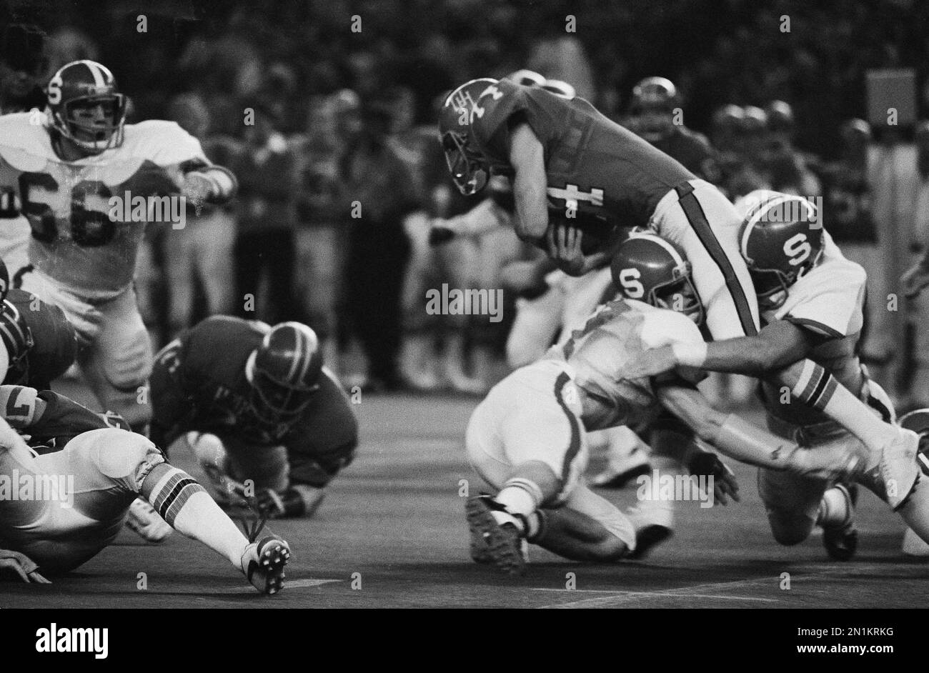 University of Houston's John Housman (44) as he hit over his left ...