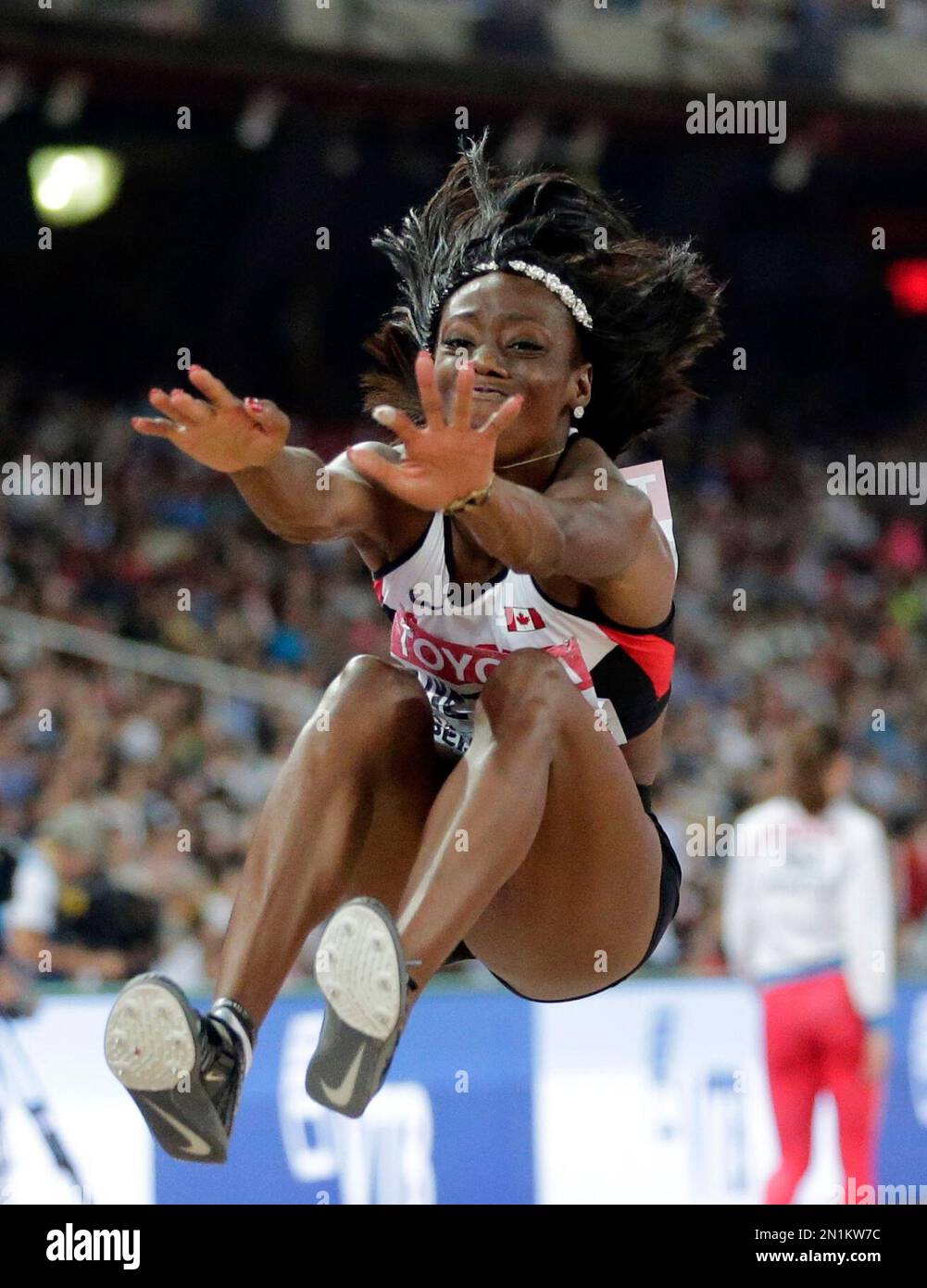 Canada's Christabel Nettey competes in the women's long jump final at ...