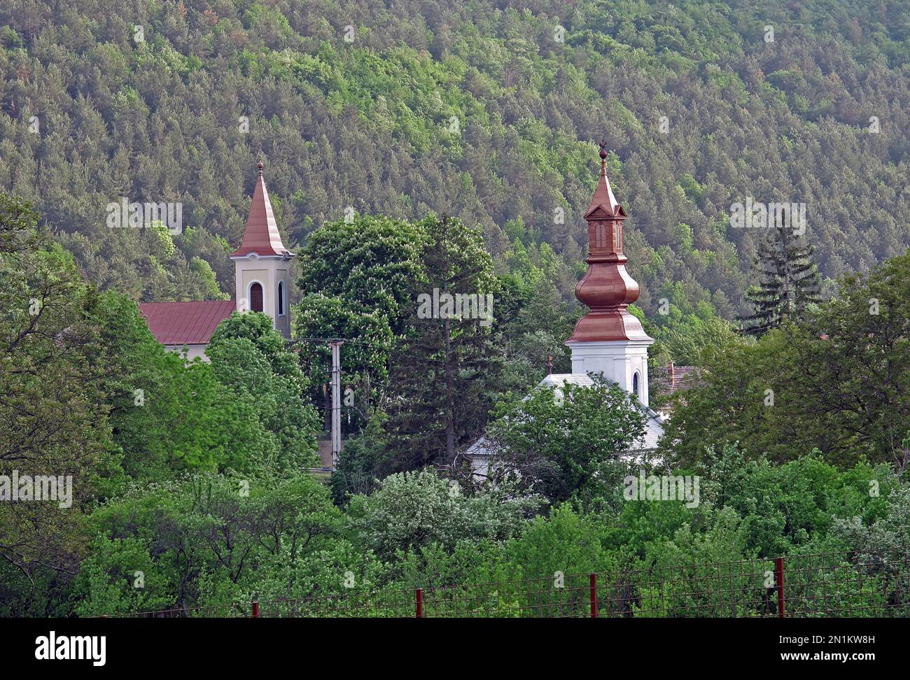 Catholic and Protestant churches side by side in the small village of ...