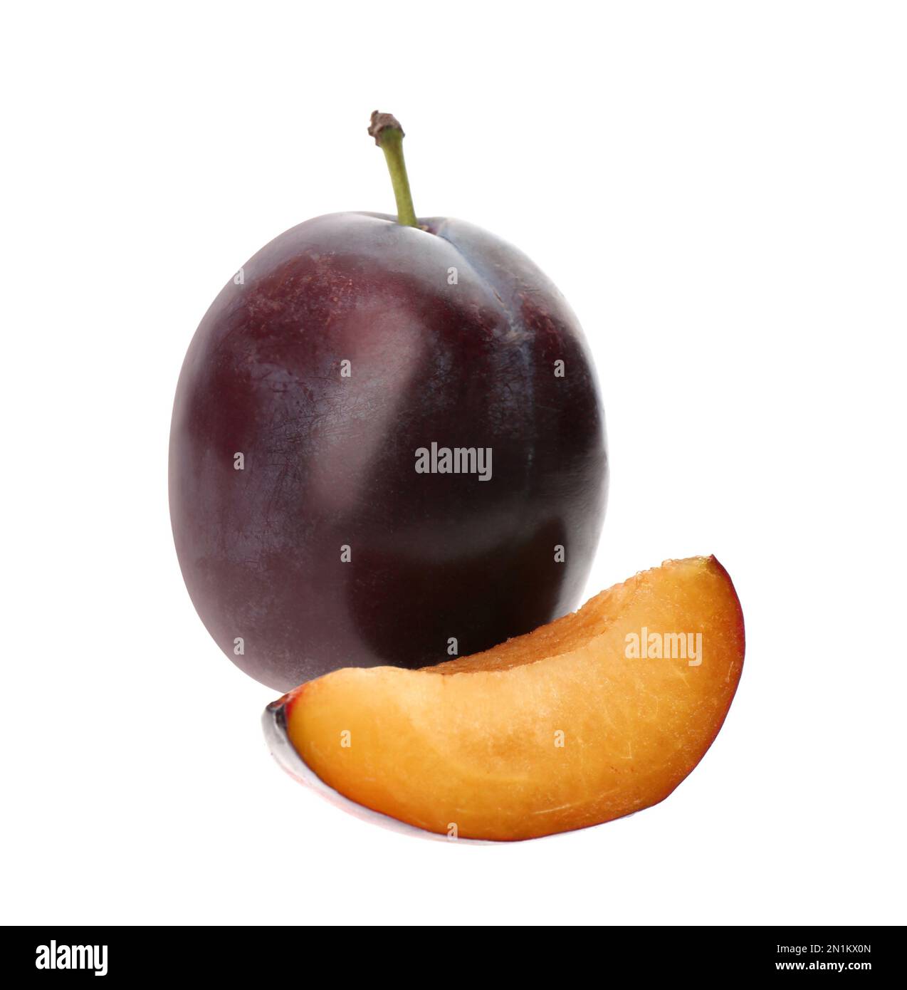 Whole and cut ripe plums isolated on white Stock Photo - Alamy
