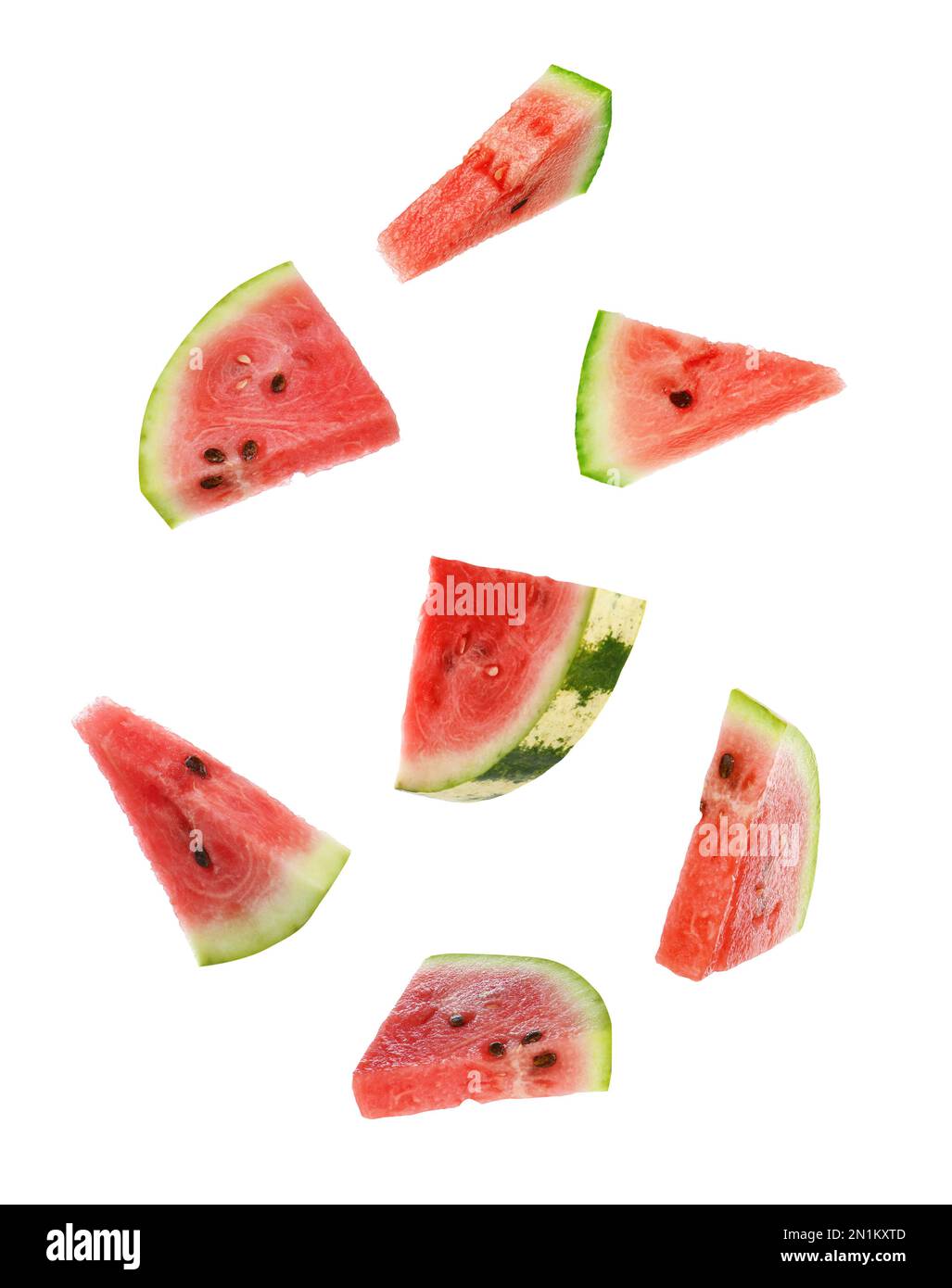 Fresh watermelon pieces falling on white background Stock Photo - Alamy
