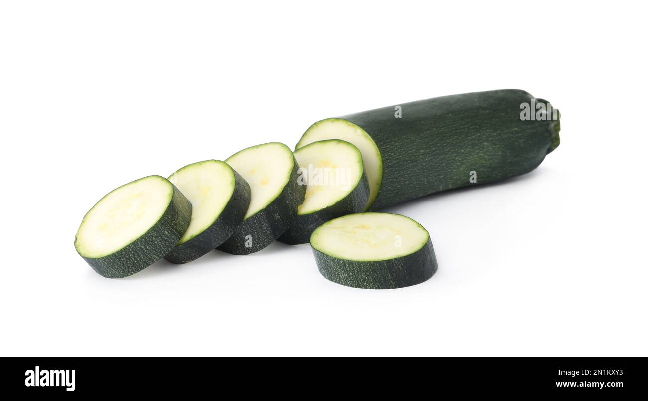 Cut green ripe zucchini isolated on white Stock Photo - Alamy