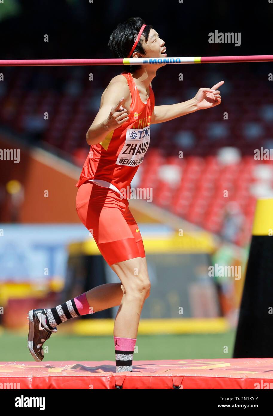 China's Zhang Guowei celebrates during the men’s high jump ...