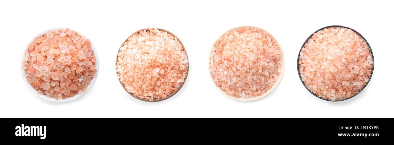 Set with pink himalayan salt in bowls on white background. Banner ...
