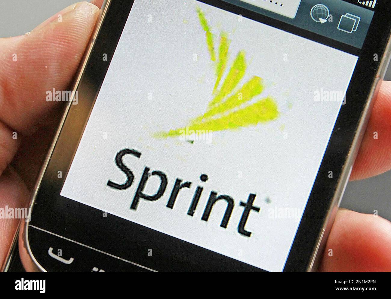 FILE - In this July 29, 2013, photo, a Sprint logo is displayed on a ...