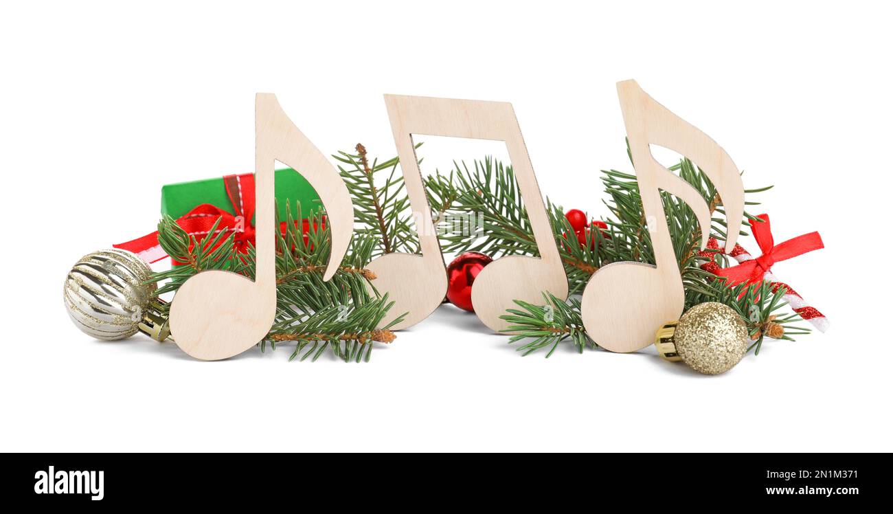 Wooden music notes with fir tree branches and Christmas decor on white ...