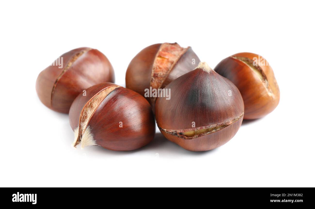 Delicious sweet roasted edible chestnuts isolated on white Stock Photo ...