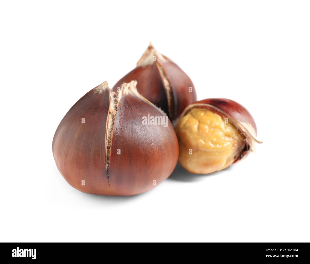 Delicious sweet roasted edible chestnuts isolated on white Stock Photo ...