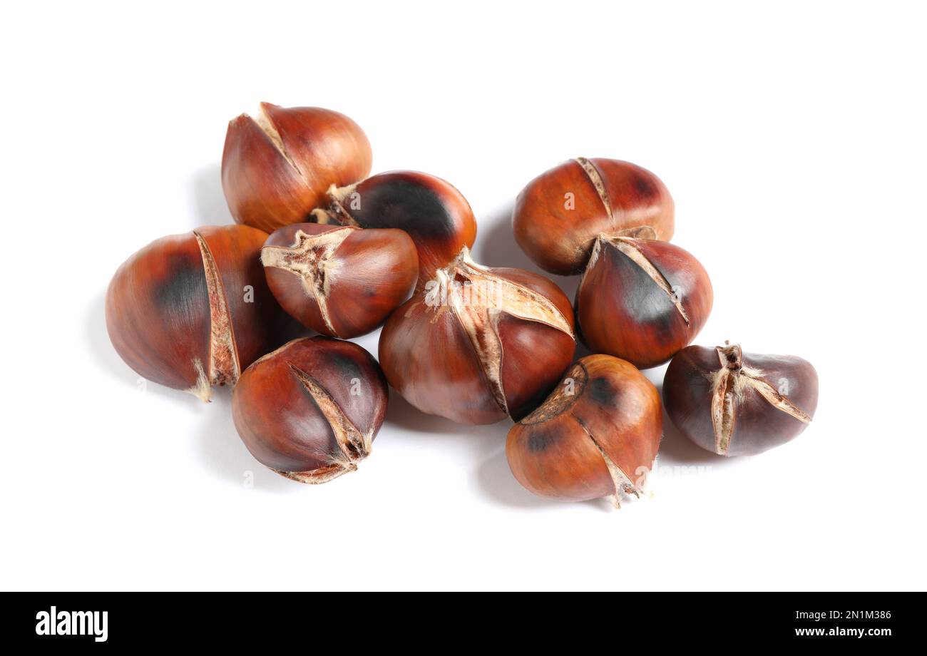 Delicious sweet roasted edible chestnuts isolated on white Stock Photo ...