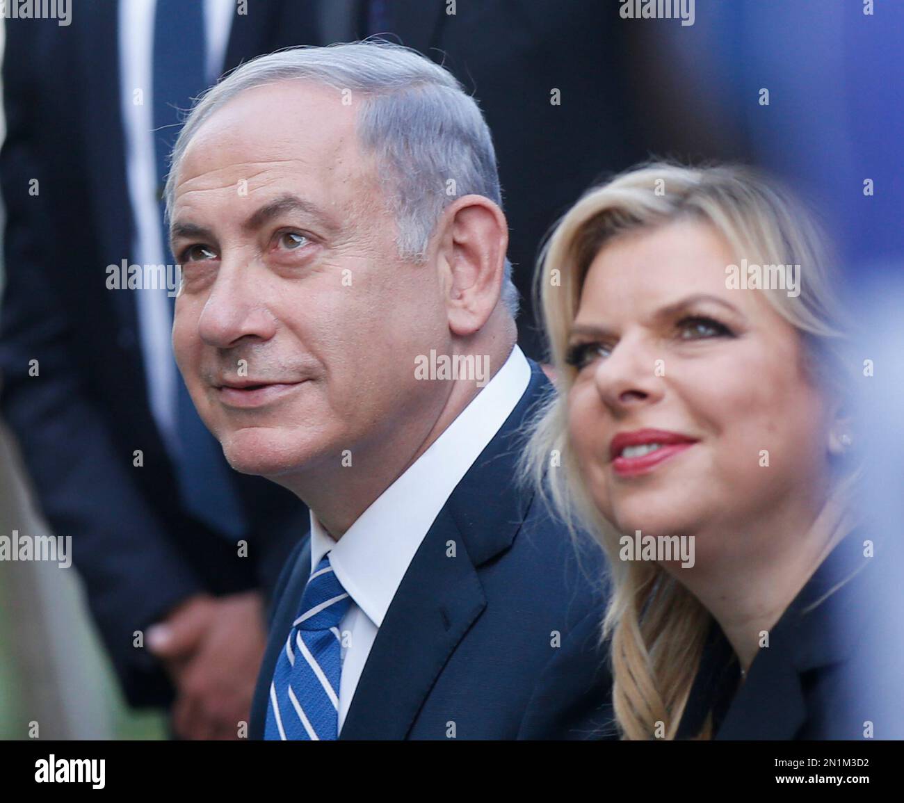 Israel's Prime Minister Benjamin Netanyahu is flanked by his wife Sara ...