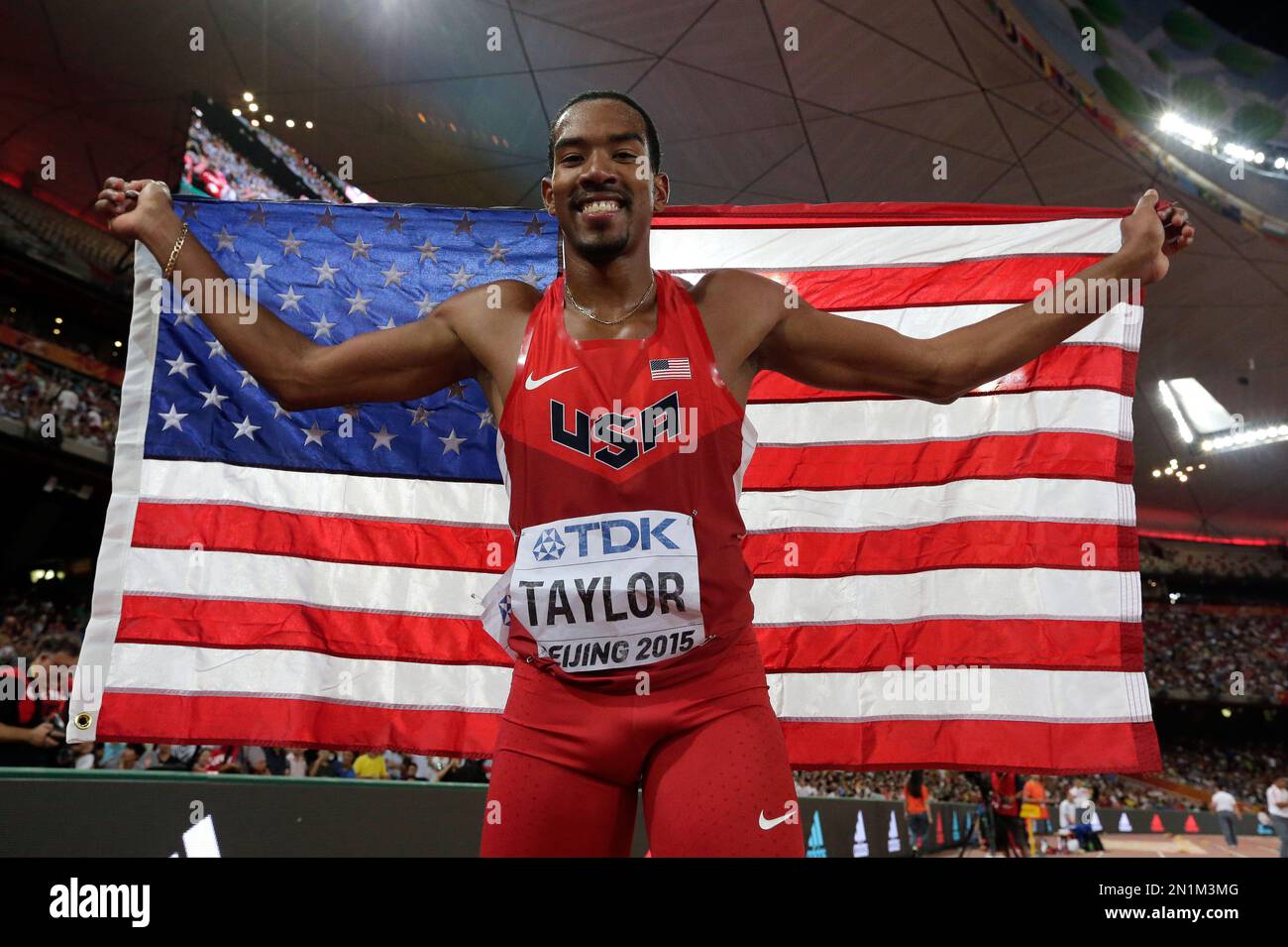 United States' Christian Taylor celebrates after winning the gold medal ...