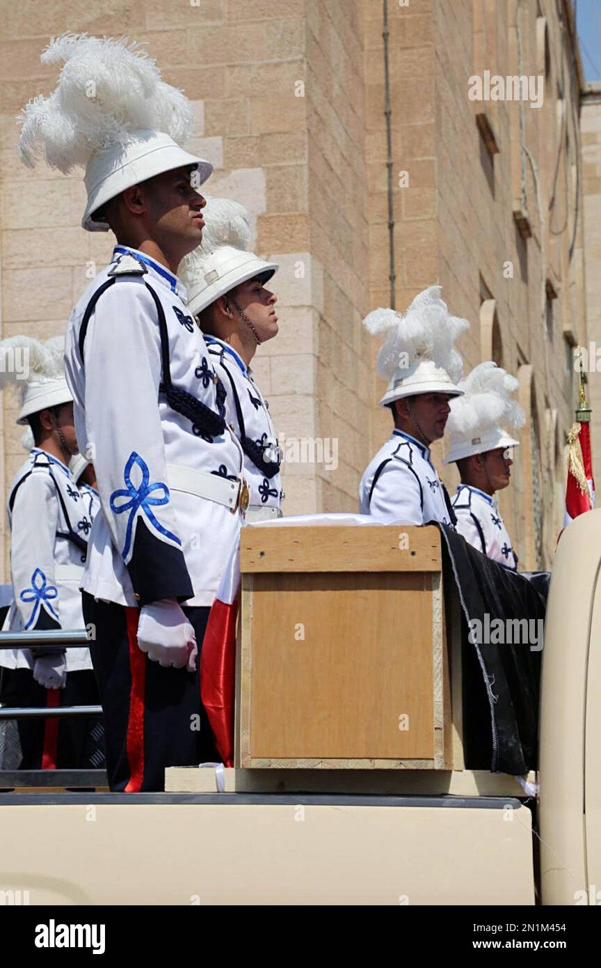 Iraqi honor guards escort the coffins of Maj. Gen. Abdul-Rahman Abu ...