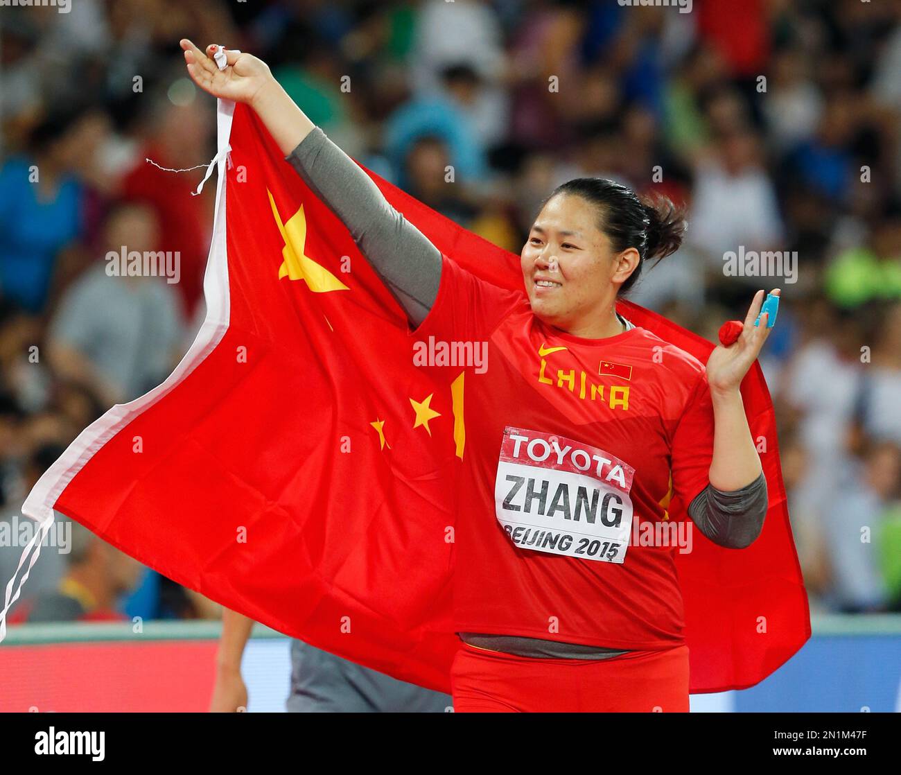 China's Zhang Wenxiu celebrates after taking silver in the women's ...
