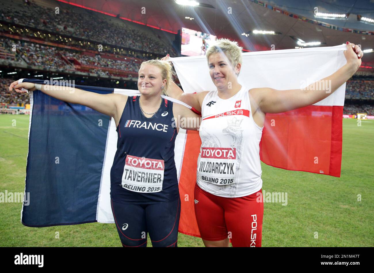 Poland's Anita Wlodarczyk, right, gold, celebrates with France's ...