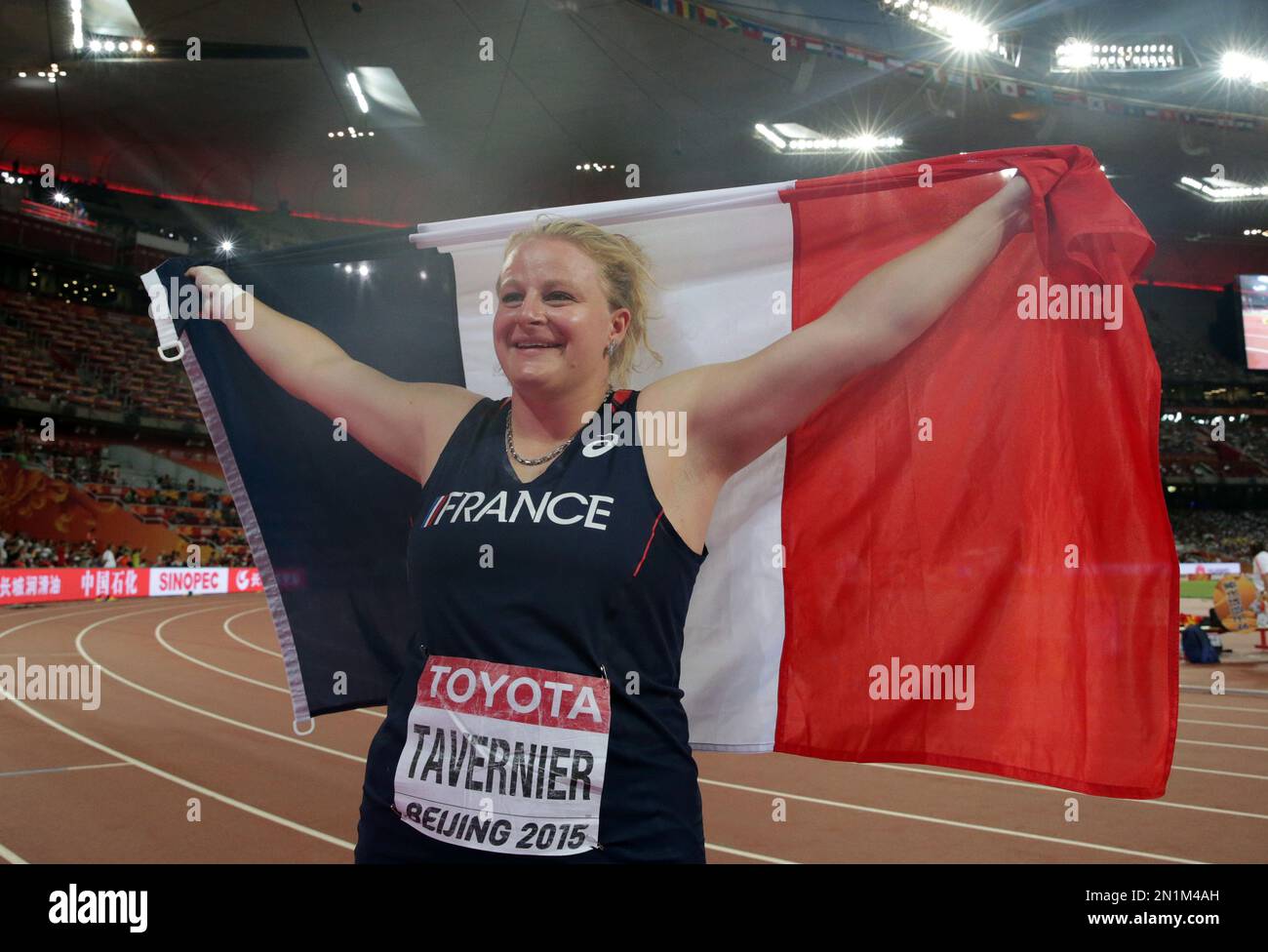 France's Alexandra Tavernier celebrates after winning the bronze medal ...