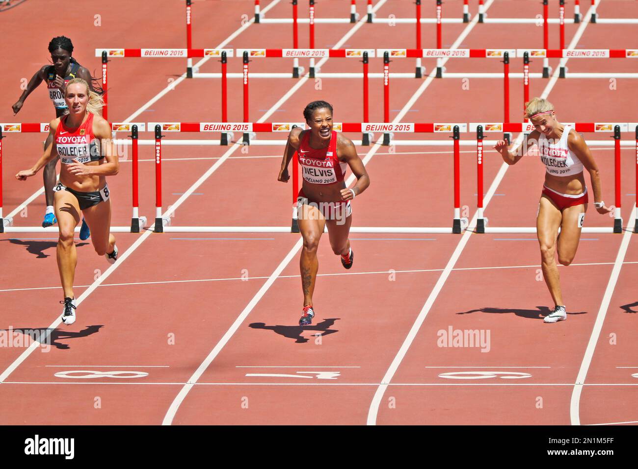 United States' Sharika Nelvis, middle, Germany's Cindy Roleder, left ...