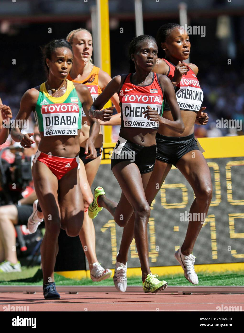Ethiopia's Genzebe Dibaba, left, Kenya's Irene Chepet Cheptai, middle ...
