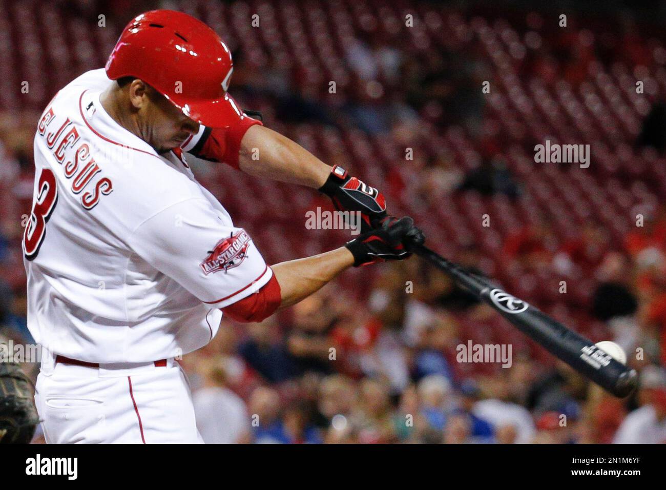 Cincinnati Reds' Ivan De Jesus hits an RBI single off Los Angeles ...